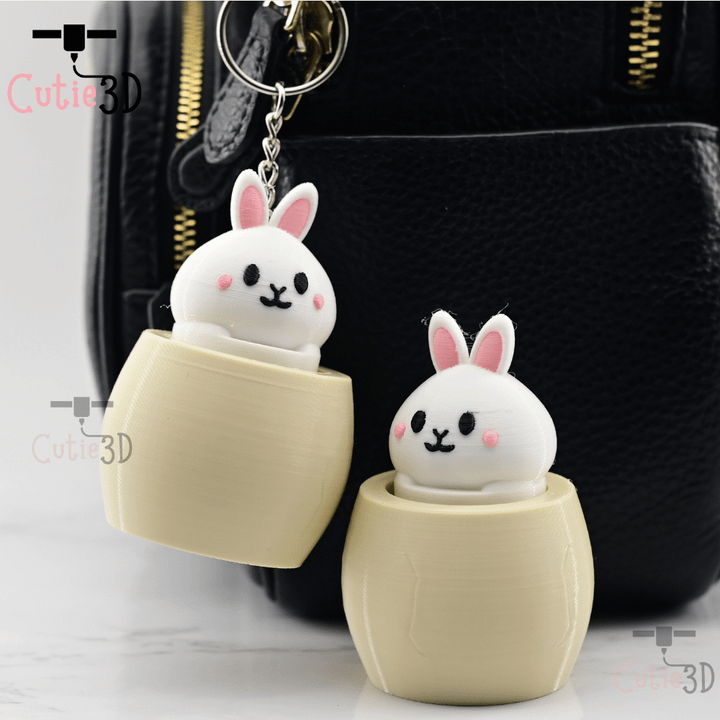 3D Printable Cutie3D Twisty Clicker Easter Bunny In An Egg - Backpack ...