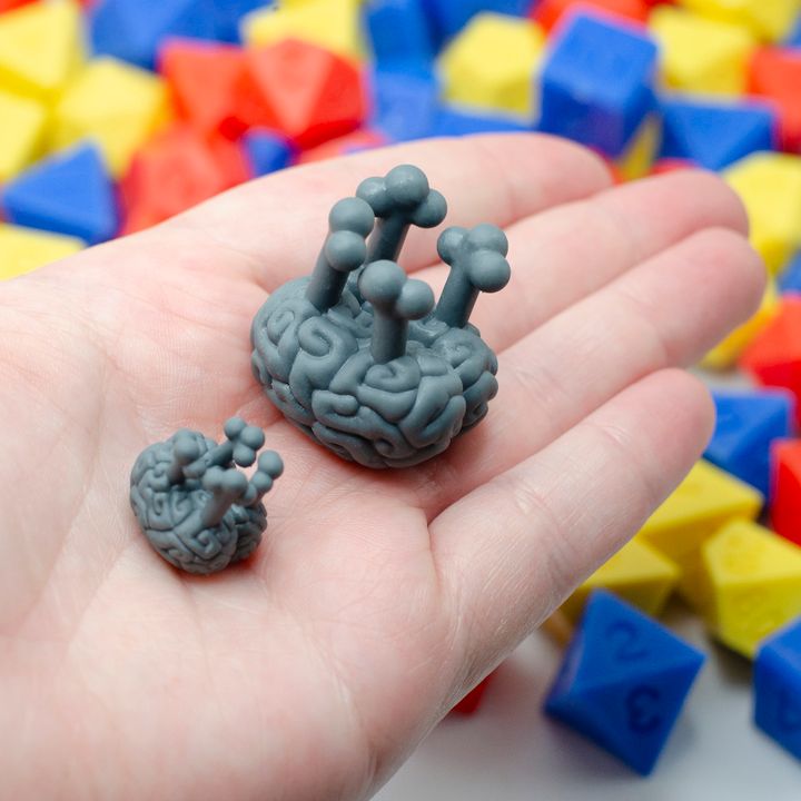 3D Printable Playful Intellect Devourer Mini & Dice Holder by Found ...
