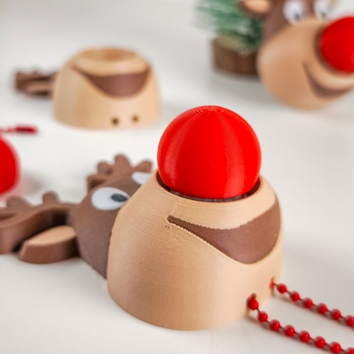 3D Printable Rudolph the Reindeer Fidget Clicker Keychain by Clickify 3D