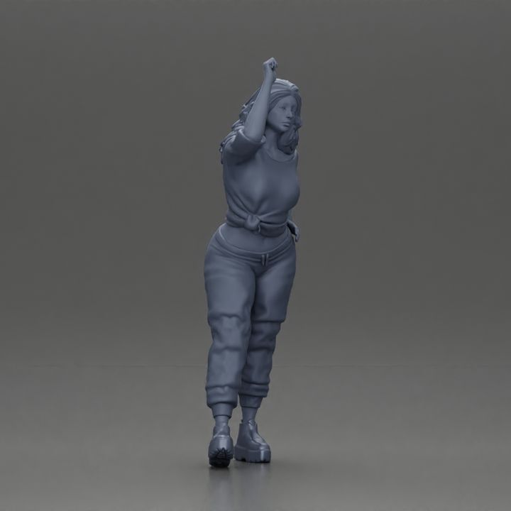 3D Printable Empowered woman confidently striking a pose in casual ...
