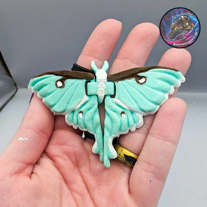 3D Printable Baby Flexi Luna Moth Keychain by Kirsten M
