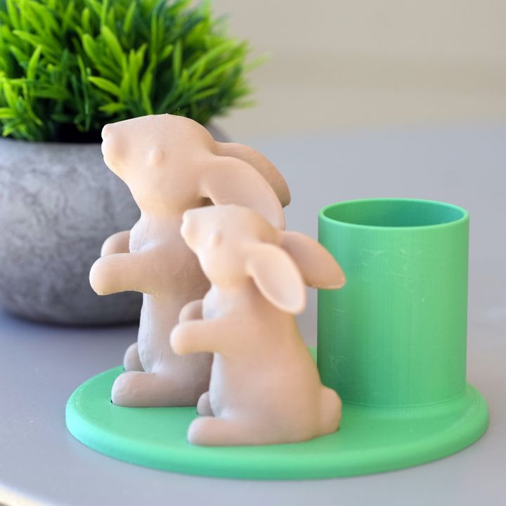 3D Printable Bunny rabbits pen holder by Philippe Barreaud