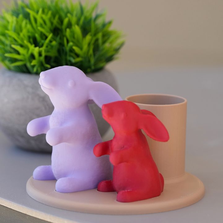 3D Printable Bunny rabbits pen holder by Philippe Barreaud
