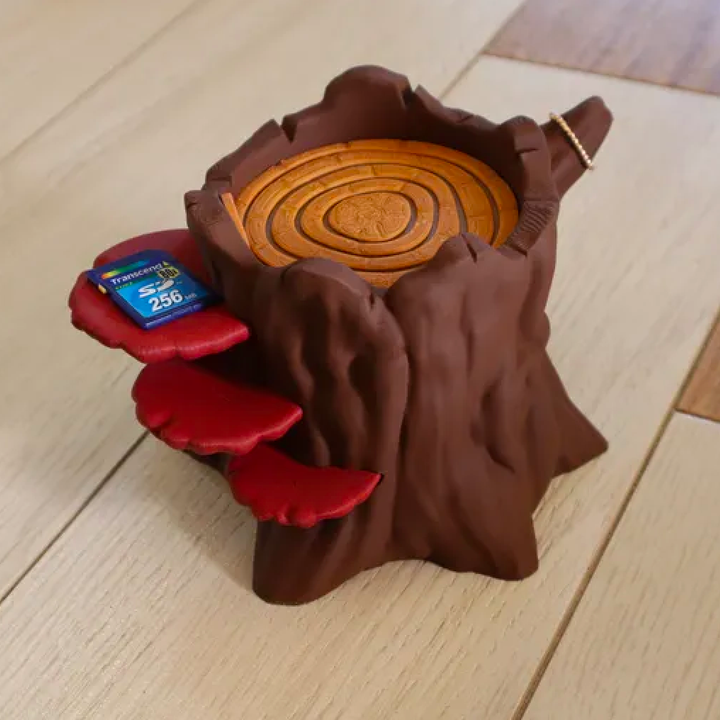 3D Printable Stylised tree stump - jewelry stand by Myron