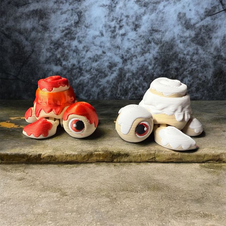 3D Printable Cinnamon Roll Turtle Clicker by Rebel Alicorn Designs