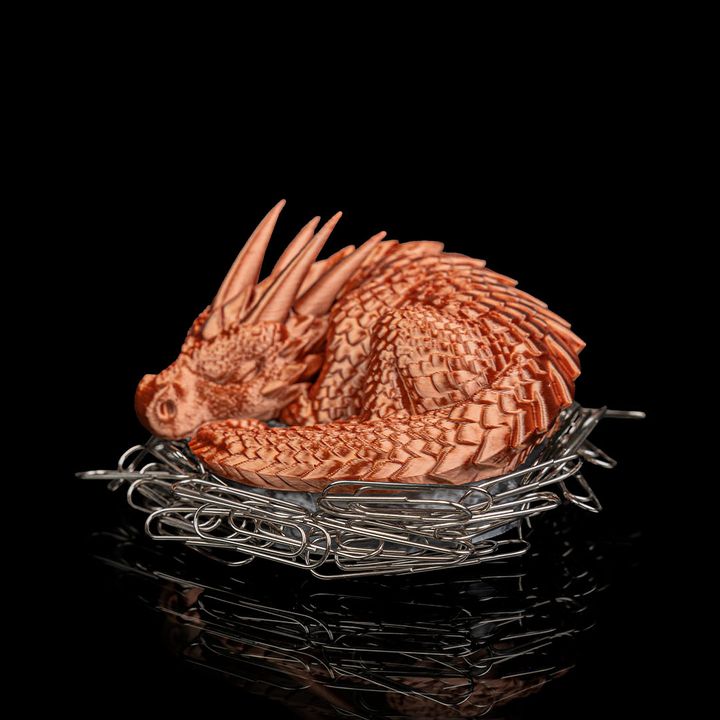 3D Printable Dragon Nest Paper Clip Holder by Stlflix