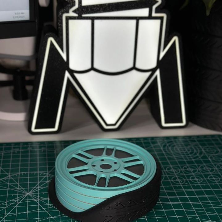 3D Printable RPF1 Style Coaster with Tire Stand by Tyler