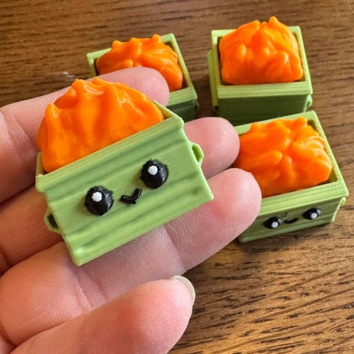 3D Printable Happy Dumpster Fire Clicky Fidget and Keychain by Jambaby ...