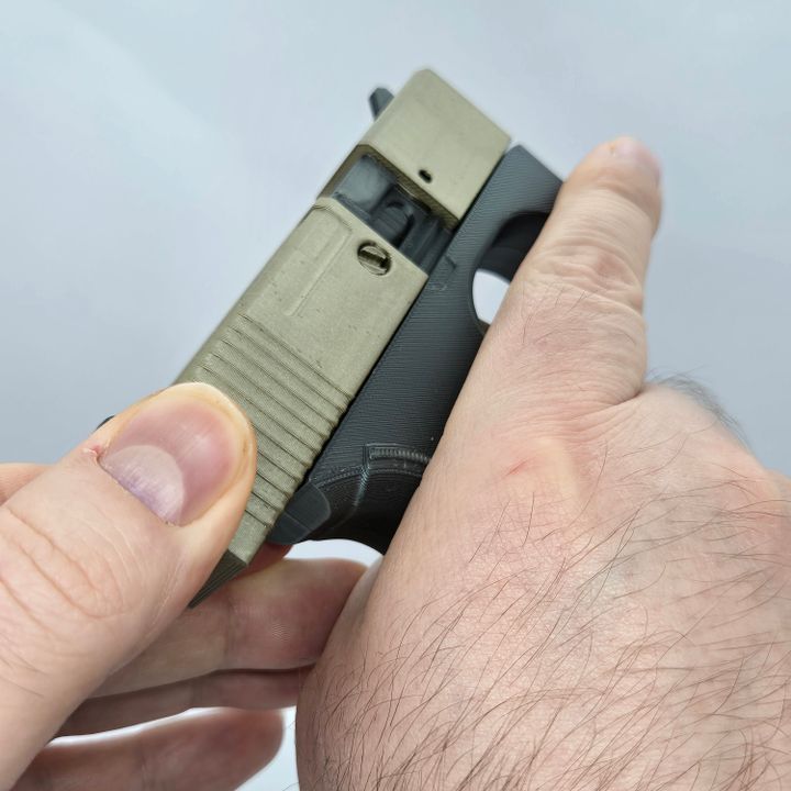 3D Printable Tickler Mini — Shell-ejecting airsoft blaster by Jaatinen3D