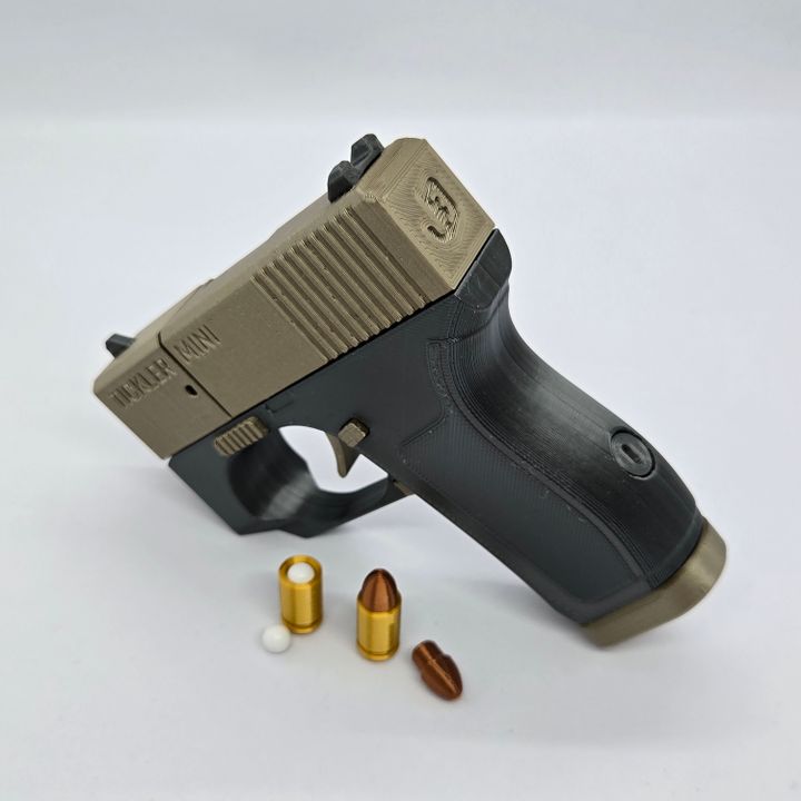 3D Printable Tickler Mini — Shell-ejecting airsoft blaster by Jaatinen3D