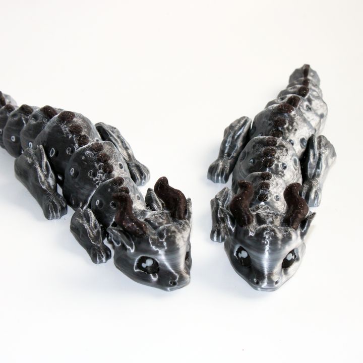 3D Printable Baby Moon Dragon by Teal Cat Creative