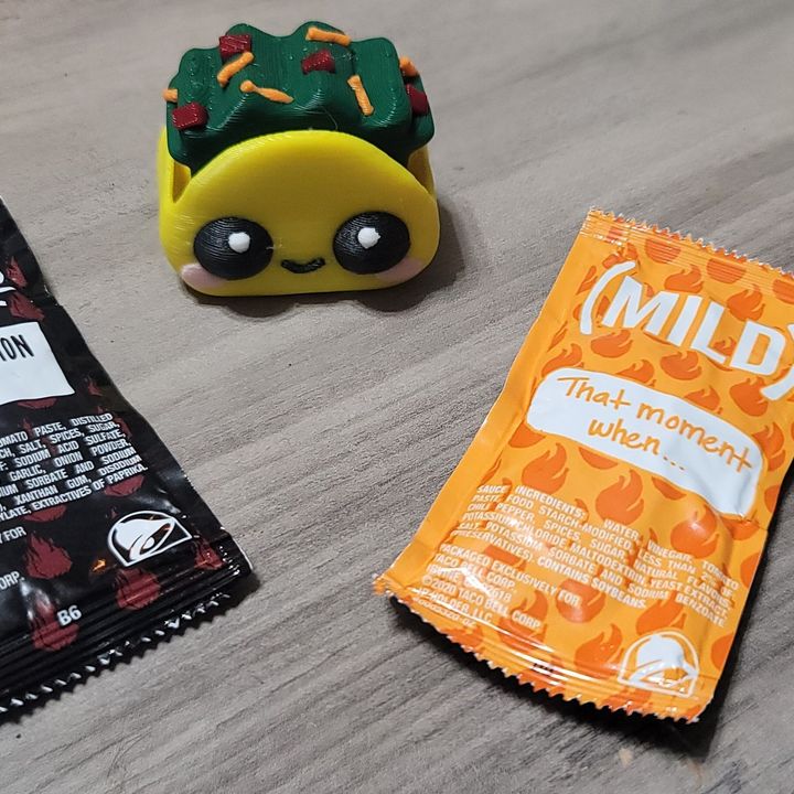3D Printable Happy Taco Clicky Fidget and Keychain by Tiffany Drewry