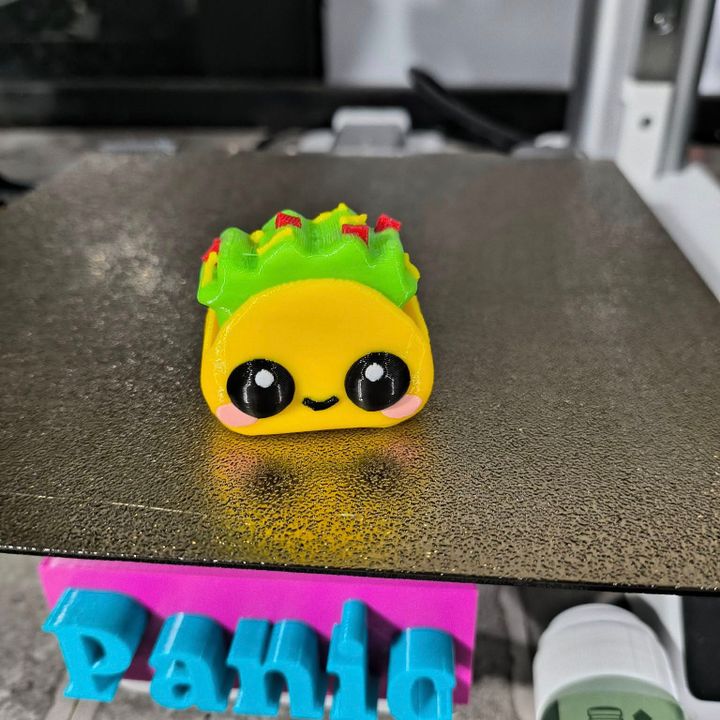 3D Printable Happy Taco Clicky Fidget and Keychain by Tiffany Drewry
