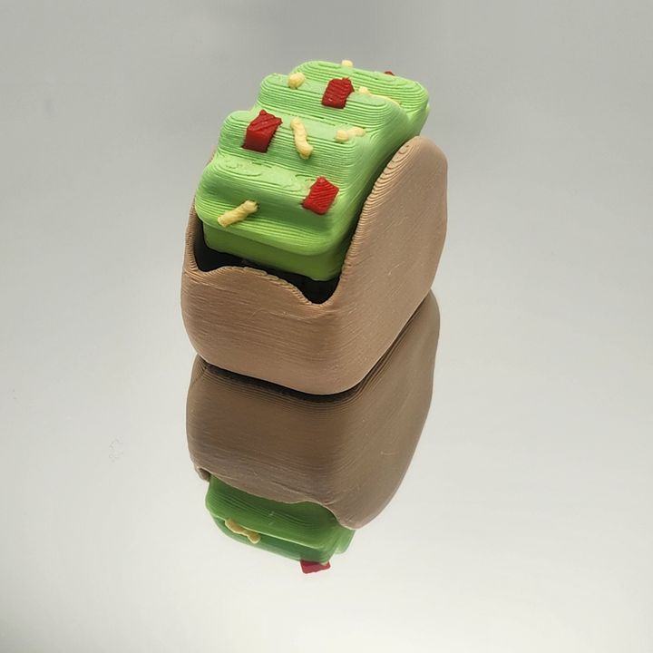 3D Printable Happy Taco Clicky Fidget and Keychain by Tiffany Drewry