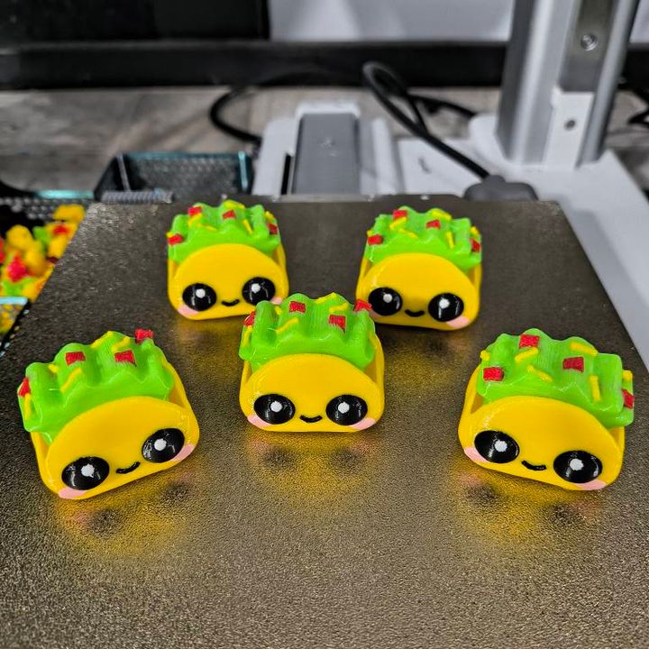 3D Printable Happy Taco Clicky Fidget and Keychain by Tiffany Drewry