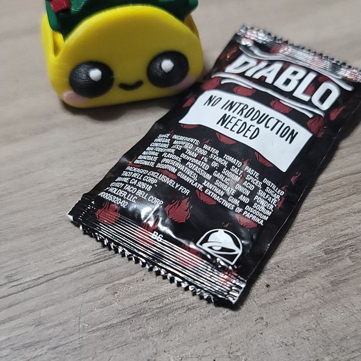 3D Printable Happy Taco Clicky Fidget and Keychain by Tiffany Drewry