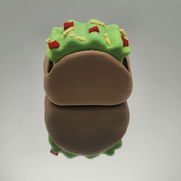 3D Printable Happy Taco Clicky Fidget and Keychain by Tiffany Drewry