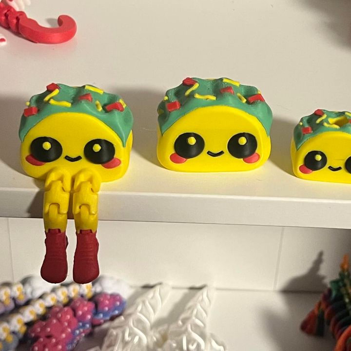3D Printable Happy Taco Clicky Fidget and Keychain by Tiffany Drewry