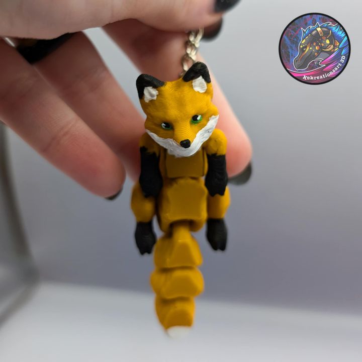 3D Printable Scruffed Baby Fox Keychain by Kirsten M