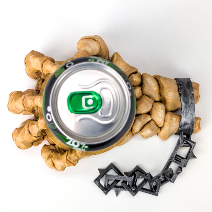 3D Printable Skeleton Hand: Halloween Self-Adjusting Coaster by KrakDrag