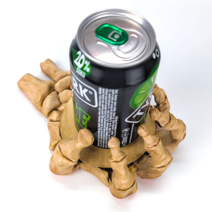 3D Printable Skeleton Hand: Halloween Self-Adjusting Coaster by KrakDrag