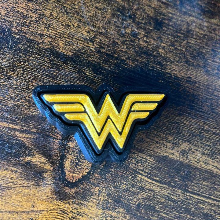 3D Printable Wonder Woman Clicker Fidget and Keychain by Jambaby Designs