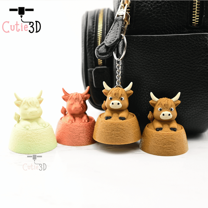 3D Printable Cutie3D Highland Cow On Hay Keycap Fidget Clicker Keychain ...