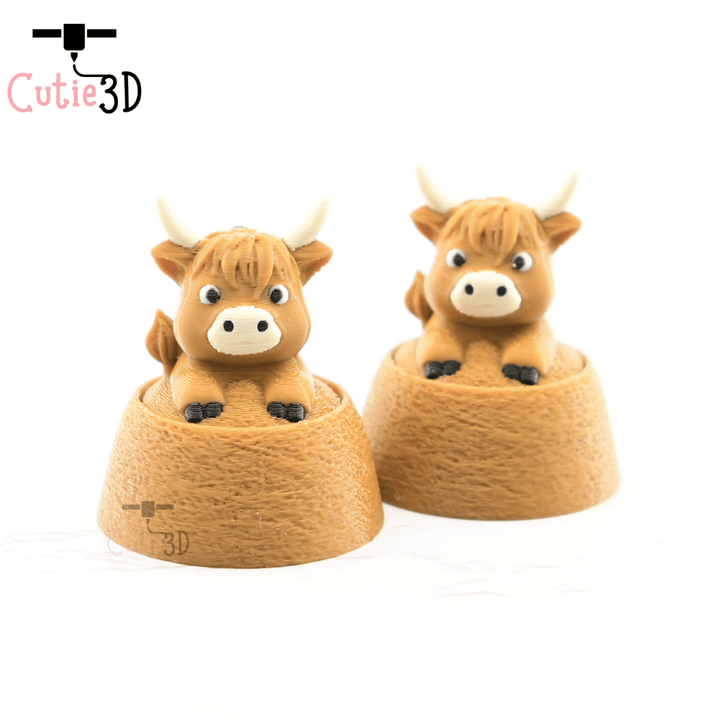 3D Printable Cutie3D Highland Cow On Hay Keycap Fidget Clicker Keychain ...