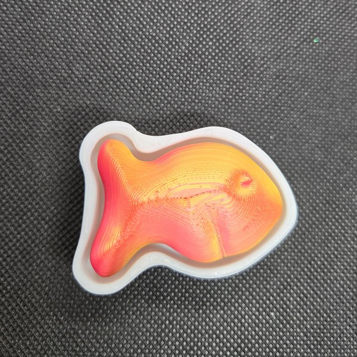 3D Printable Goldfish Cracker Clicker Fidget and Keychain by Jambaby ...