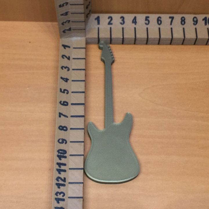 3D Printable Smiley Tones Instruments -Bass Guitar by Star Labs 3D, LLC